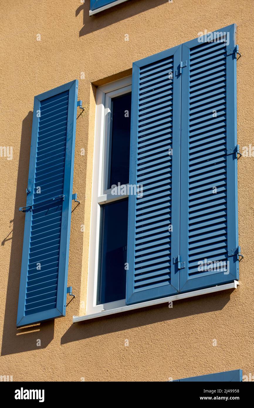 Window with beautiful new folding shutter in Mediterranean style Stock ...