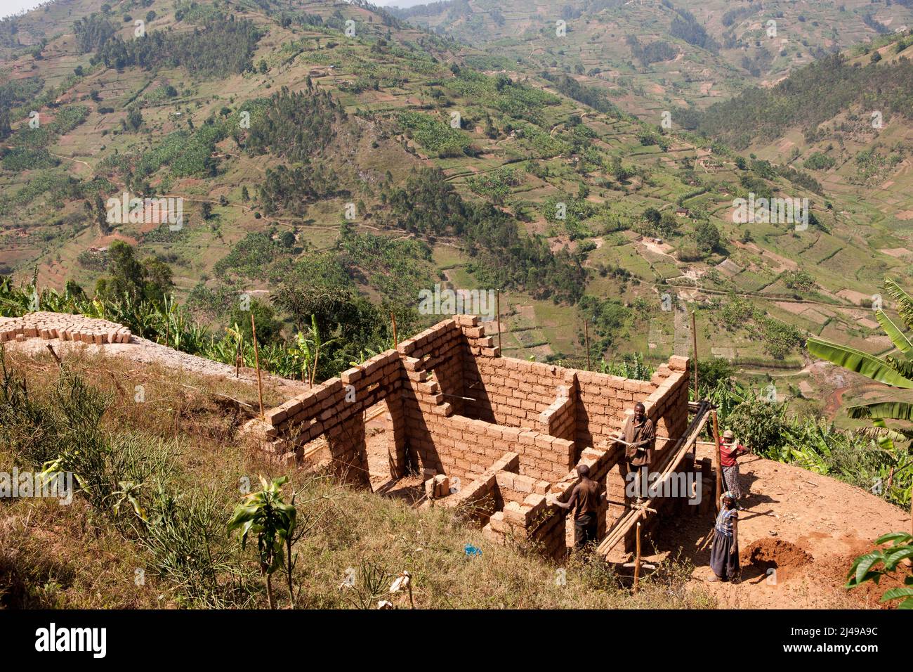 A family building a new house, Bukinga village, Ruganga Cell, Gakenke ...
