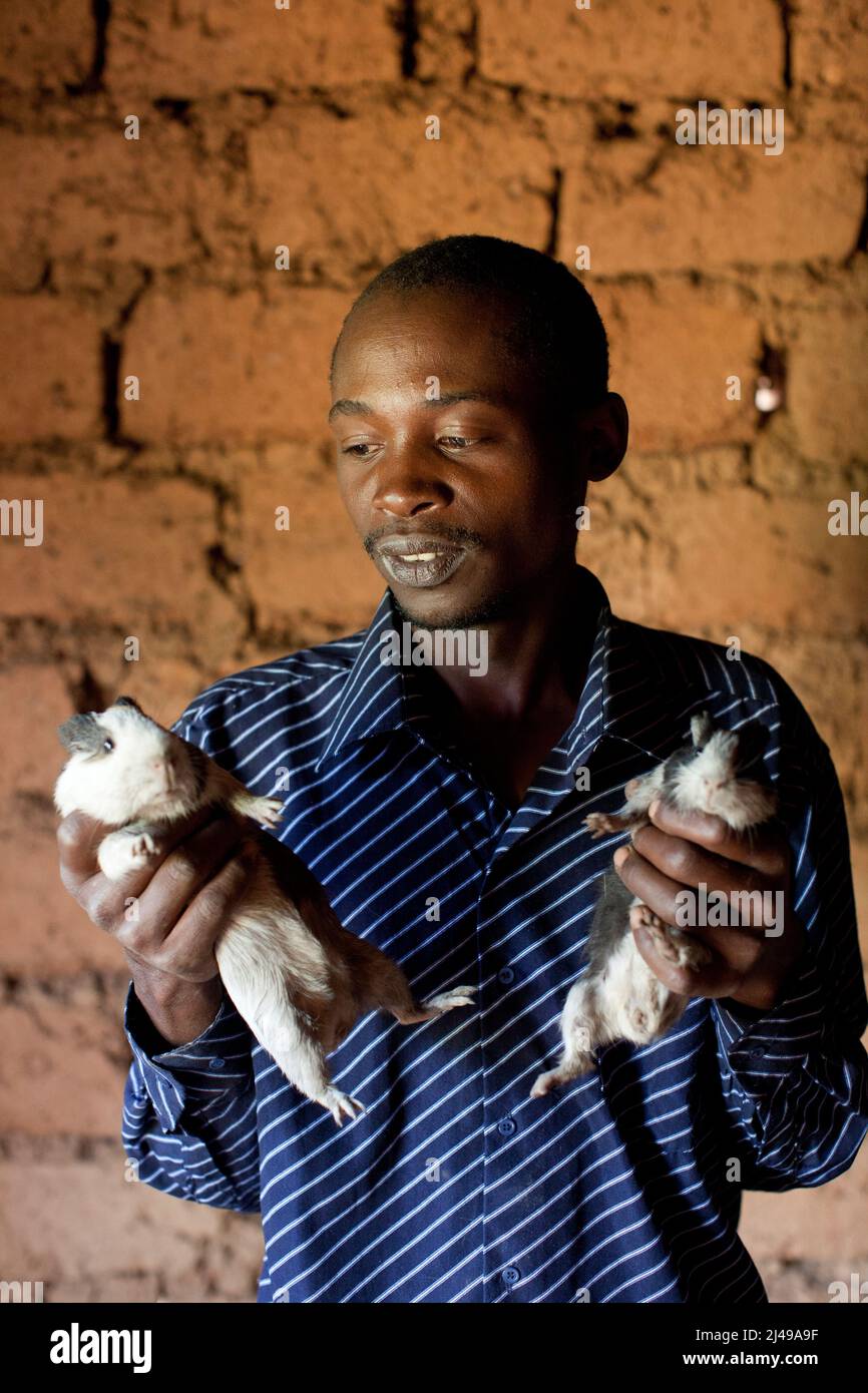 Jean Bachimas Mbarushimana, 36, wife Gertude Bambazimama, 32 and children Eric Niyonsenga, 11 ...