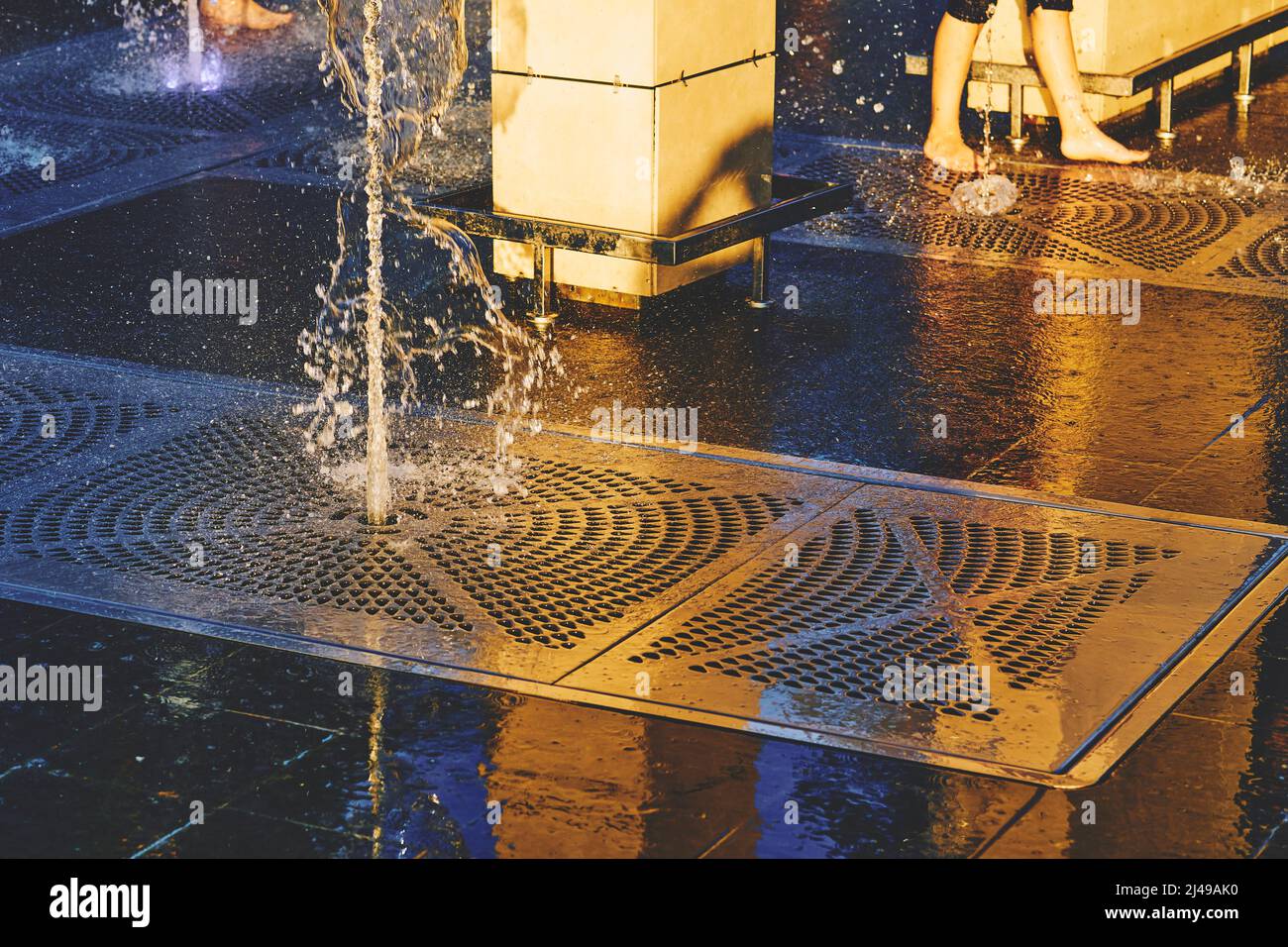 Cool water fountains flow in the summer heat Stock Photo - Alamy