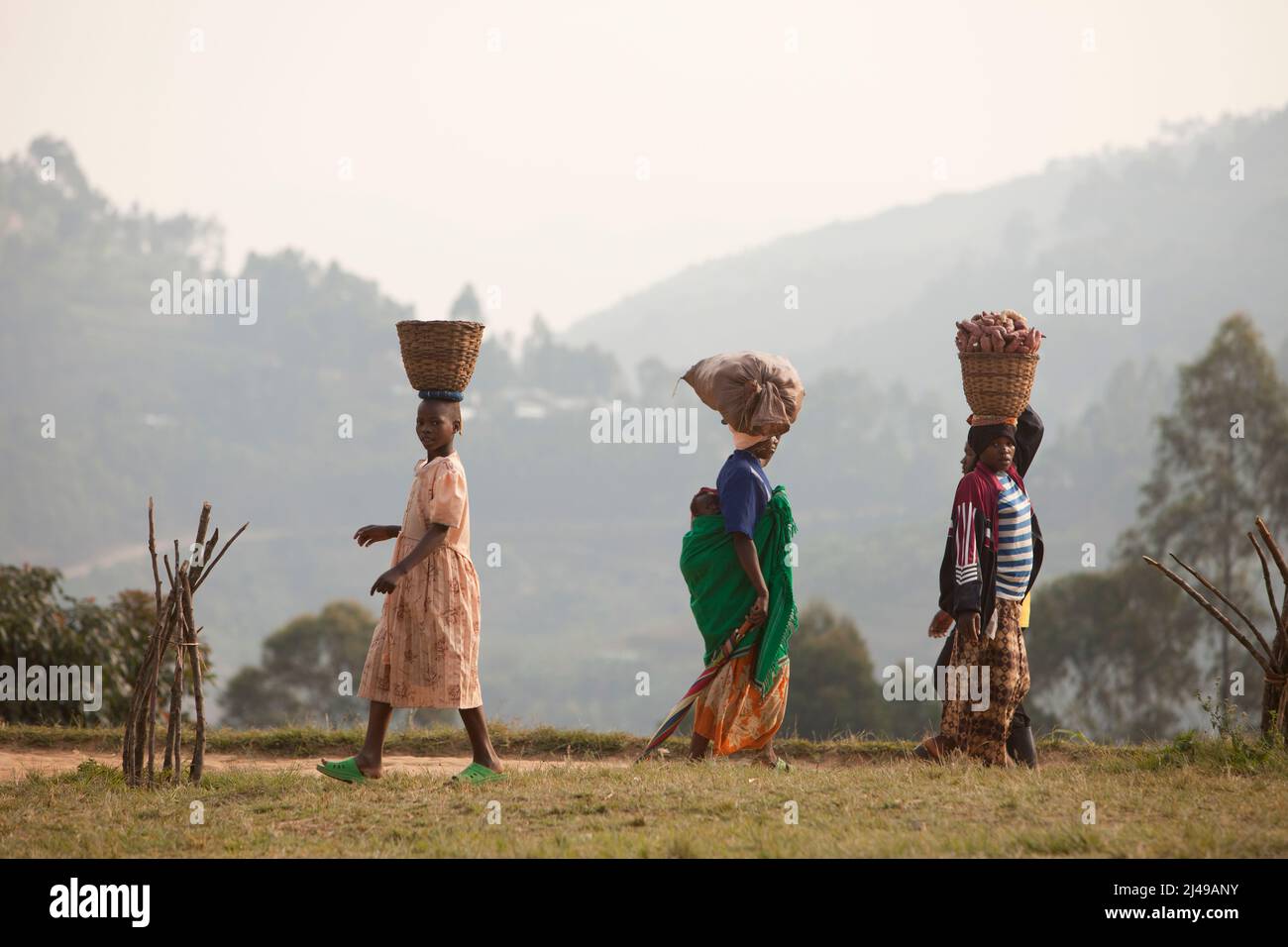 People bring their goods to Bushoka village market, Gasiza cell ...