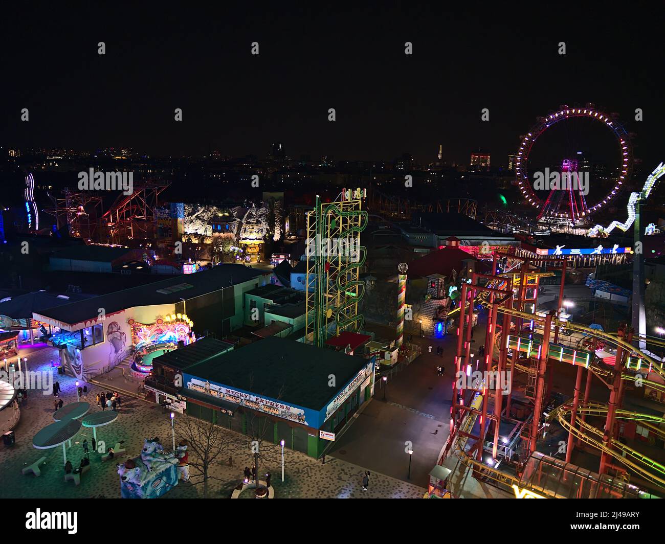 Aerial view over amusement park Wurstelprater in the dark in Vienna ...