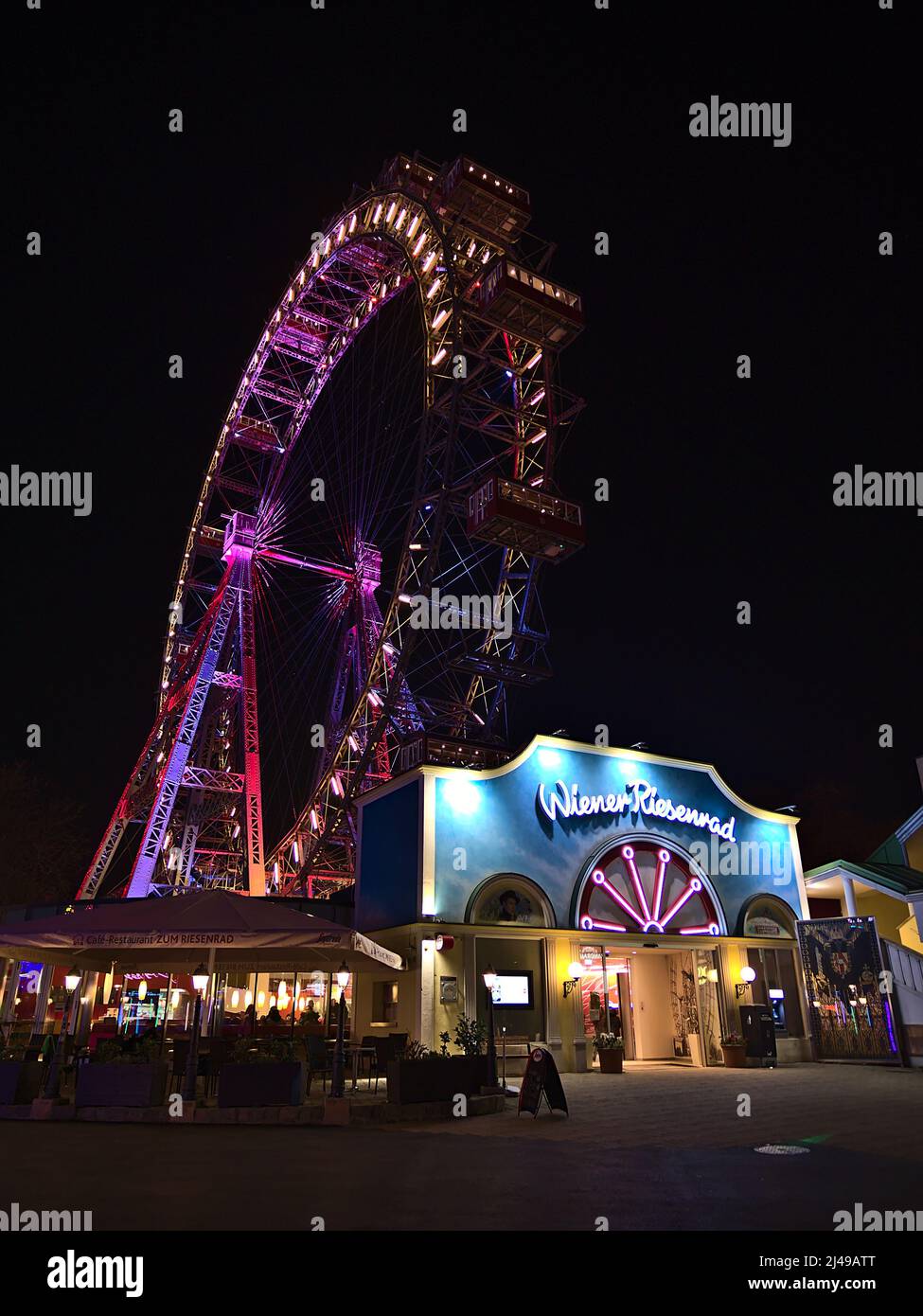 Beautiful view of famous ferris wheel Wiener Risenrad in amusement park ...