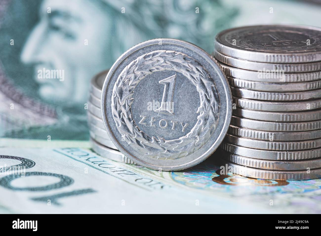 Polish 1 zloty coin. PLN, Polish money, a stack of coins Stock Photo ...