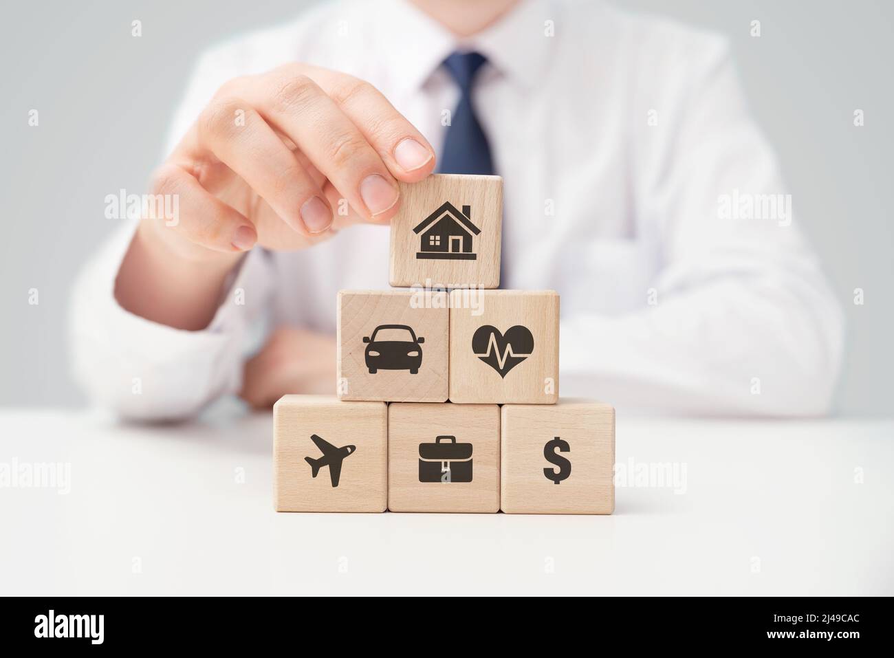 Social security concept. Insurance agent and wooden blocks with ...