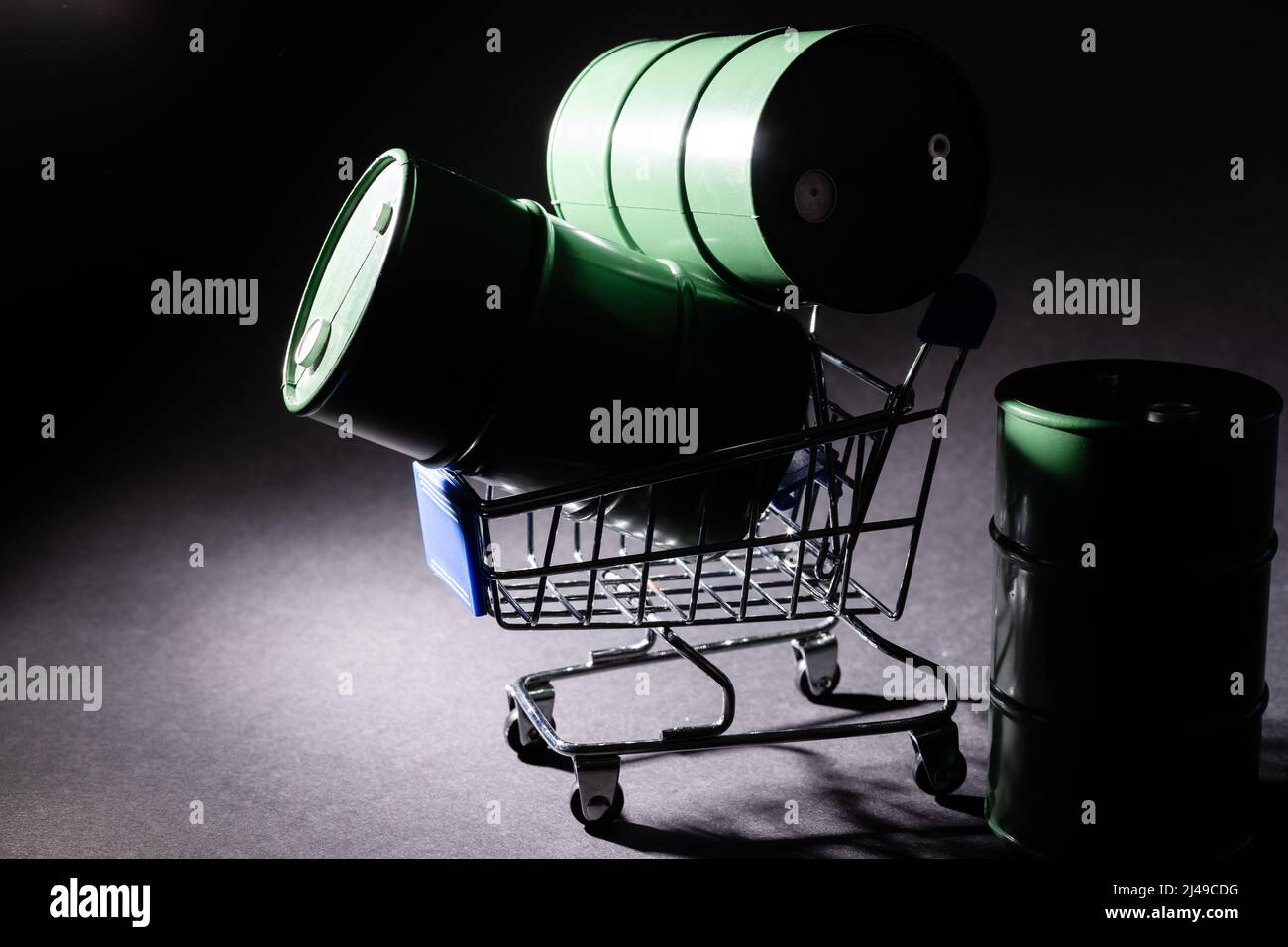 Miniatures toy barrels on a shopping cart Stock Photo - Alamy