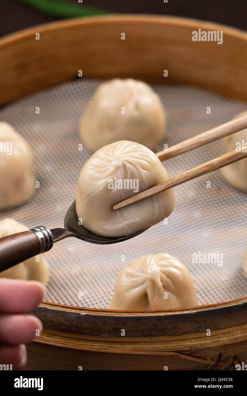 Steamed pork soup dumplings named Xiao long bao in Taiwan, Taiwanese ...