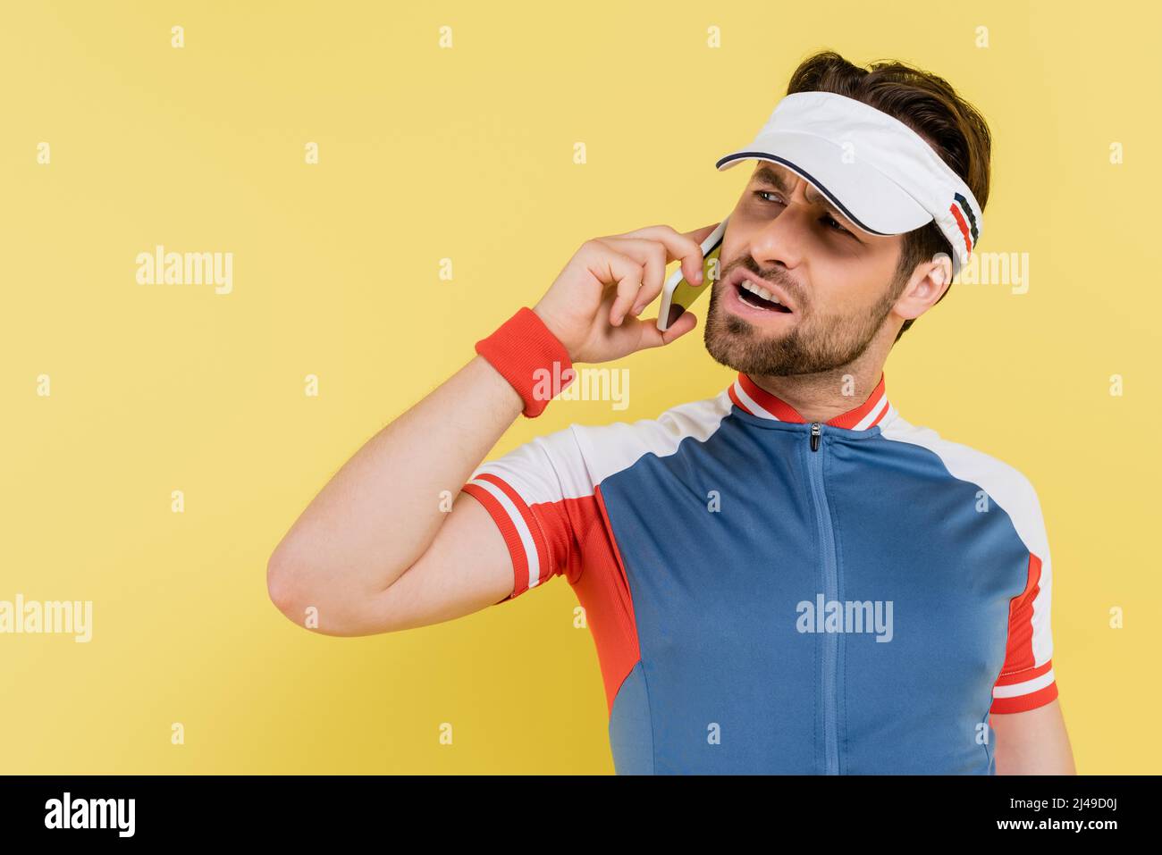 Cheerful sportsman talking on hi-res stock photography and images - Alamy