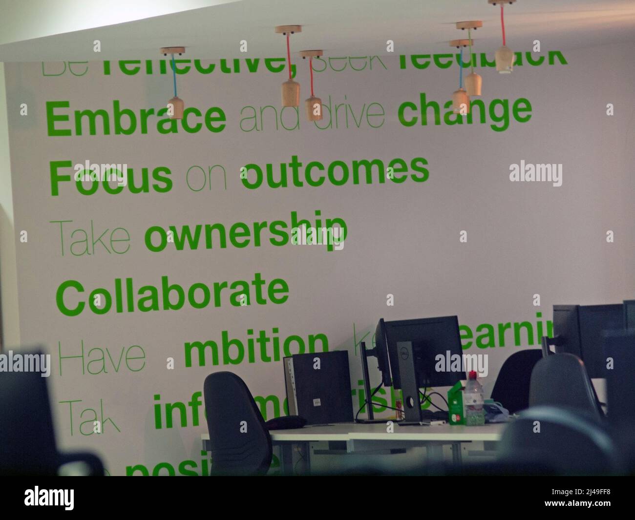 Inspiring words on an office wall in Brighton Stock Photo - Alamy