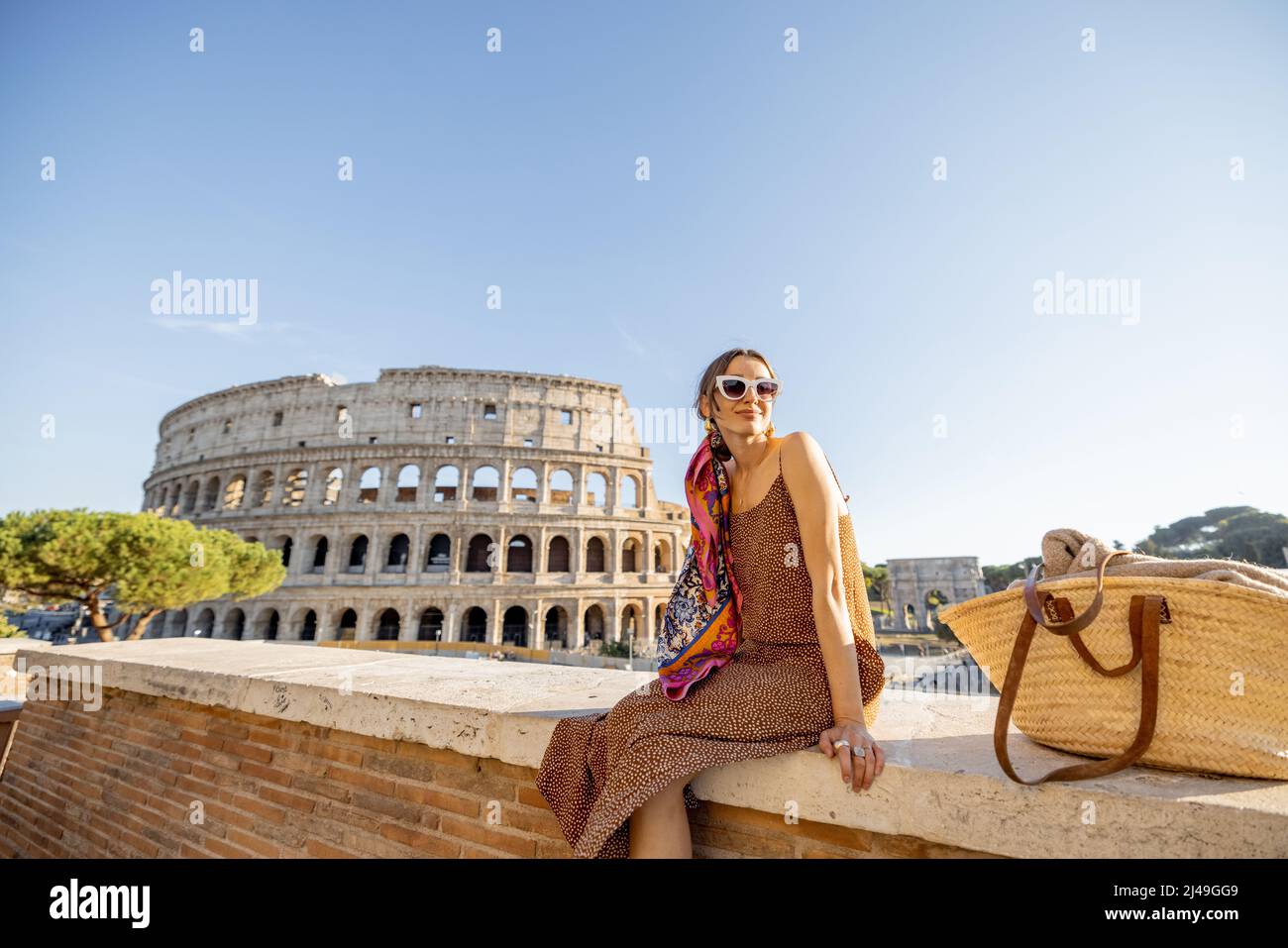 Woman near Coliseum in Rome Stock Photo - Alamy