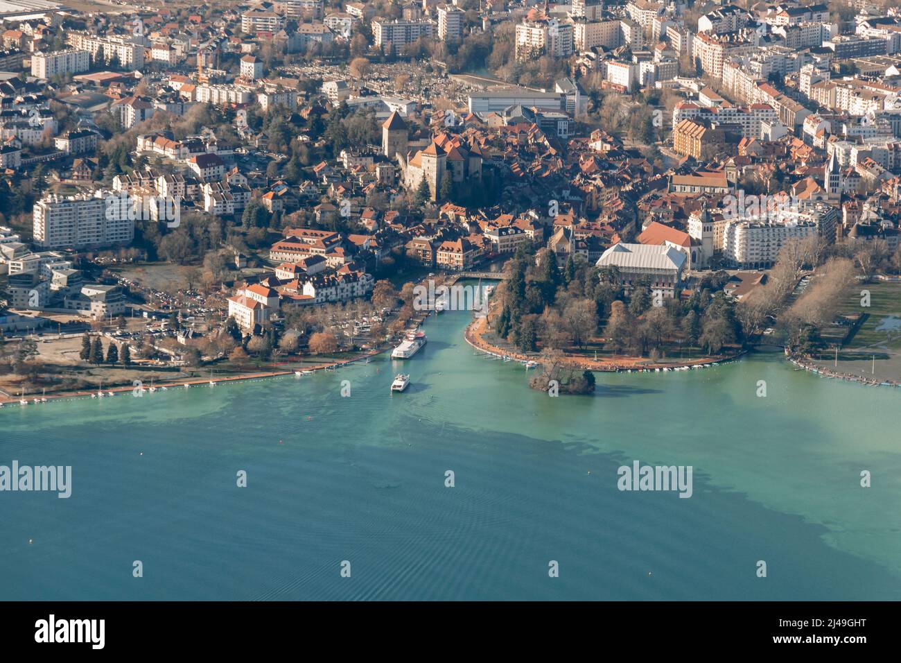 Aerial sunrise view of Annecy lake waterfront and old town with ...