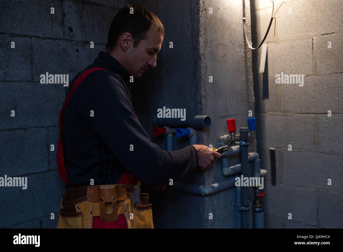 Builder handyman with construction tools. House renovation background ...