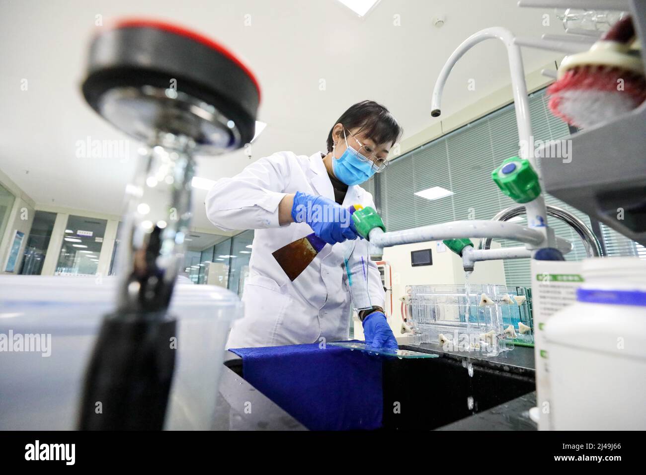 ZHANGYE, CHINA - APRIL 12, 2022 - A staff member disassembly film for ...