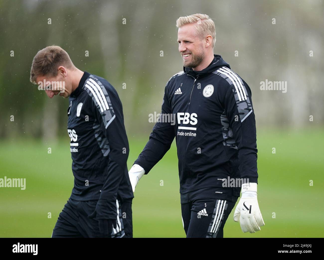 Leicester City goalkeeper Kasper Schmeichel (right) and Marc Albrighton ...