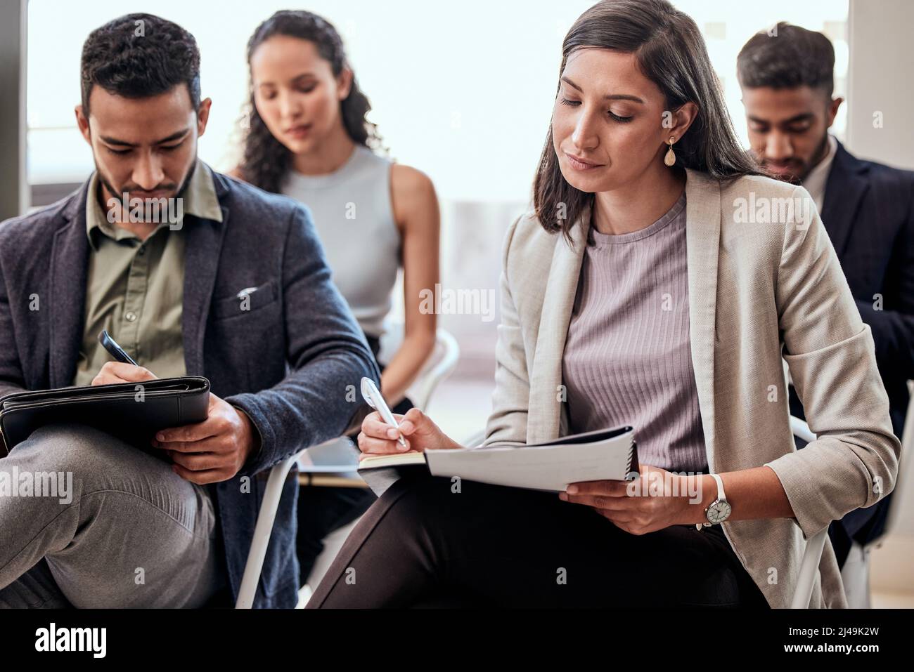 This is a good learning experience. Shot of a group of businessspeople ...