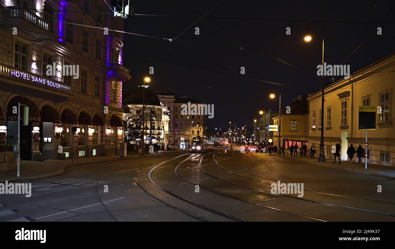 Night view of illuminated city street Burggasse in the historic center ...