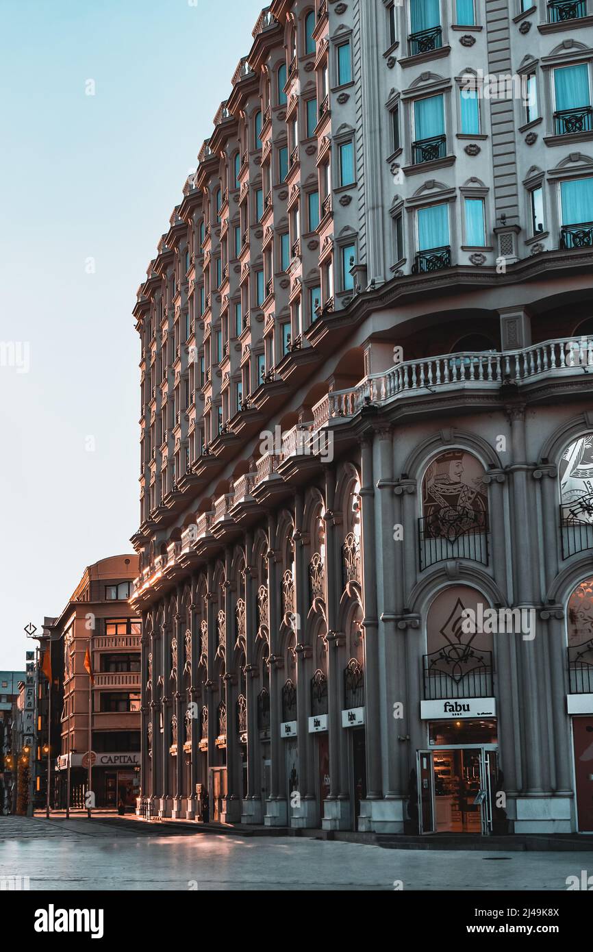 Sunset against the casino facade in the Skopje old town, North ...