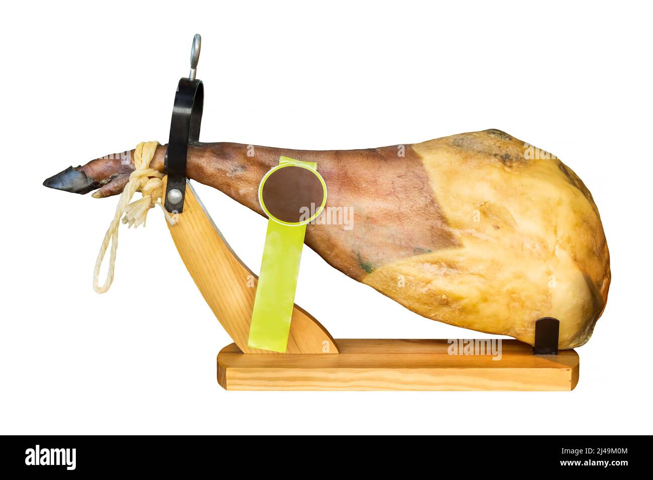 Traditional Spanish ham pork leg on a wooden stand isolated on a white ...