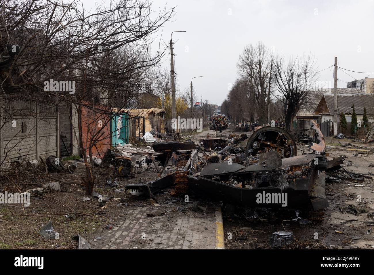 The streets of bucha are full of burned tanks and weapons used in the ...