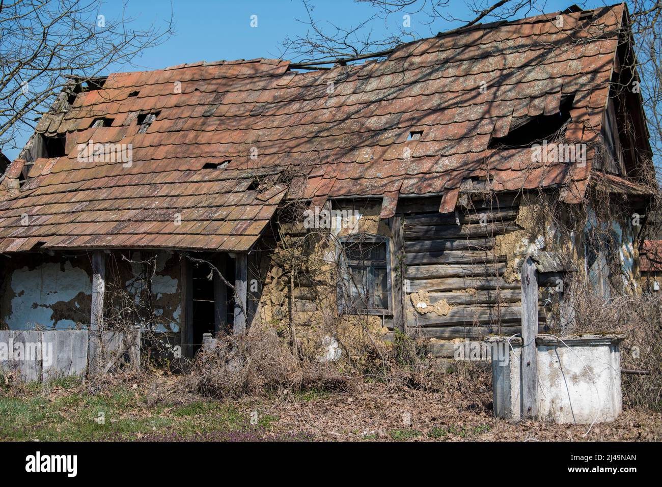 Sunja, Croatia, April 22,2022: Abandoned traditional old wooden house ...