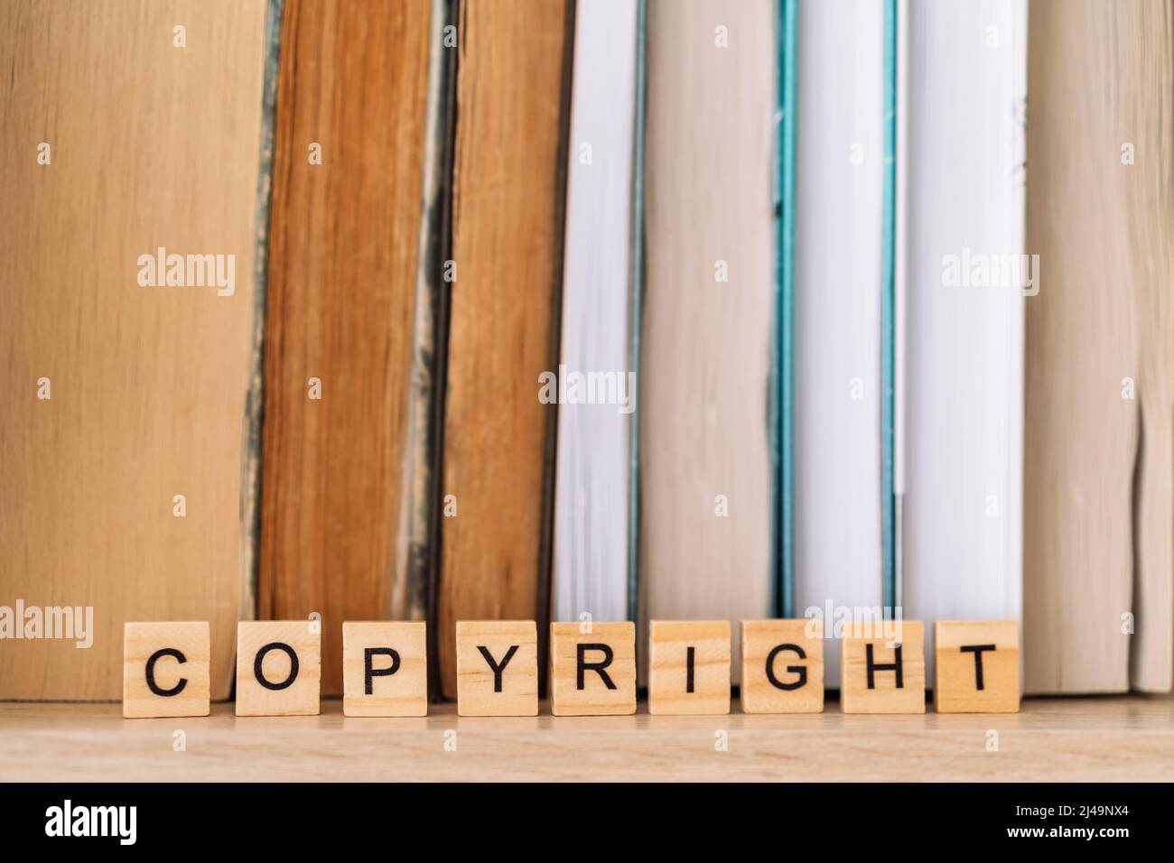 On the bookshelf, the word copyright opposite books Stock Photo - Alamy