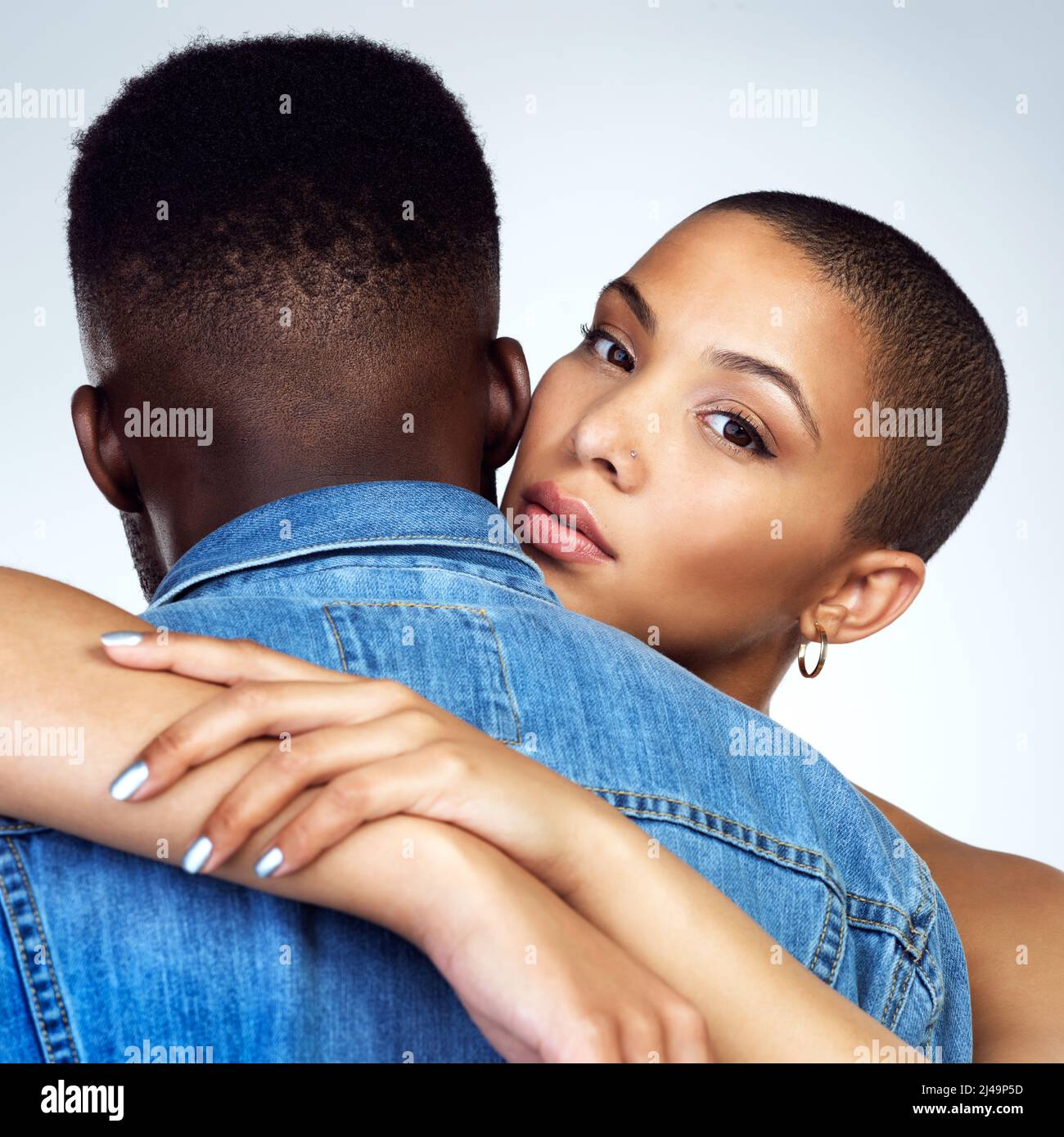 Young couple back to back serious hi-res stock photography and images ...