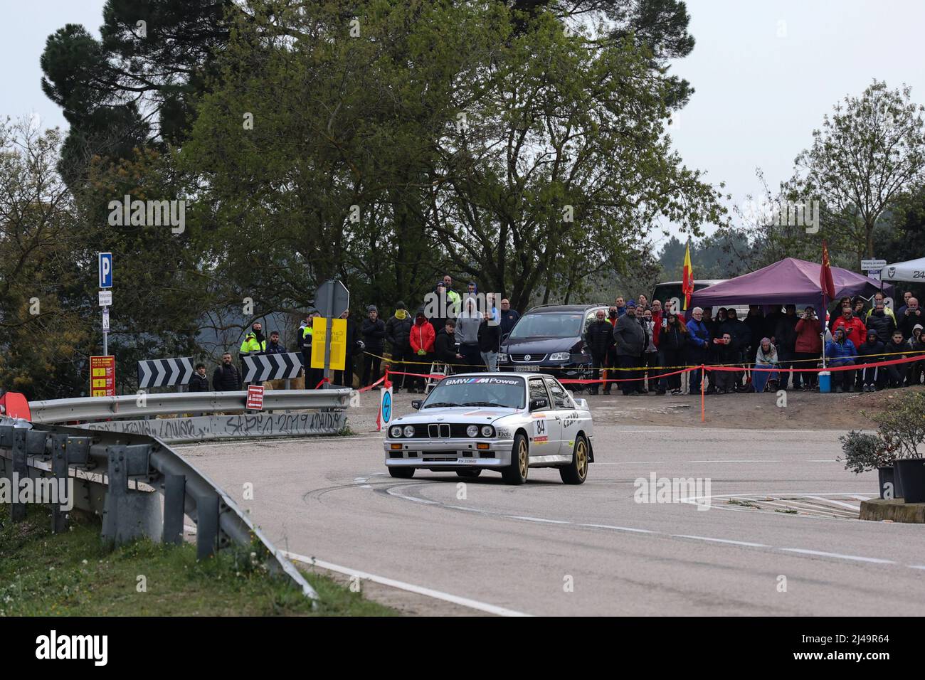 Historic Rally Costa Brava 2022 - BMW M3 car competing in timed road section in Girona, Spain ...