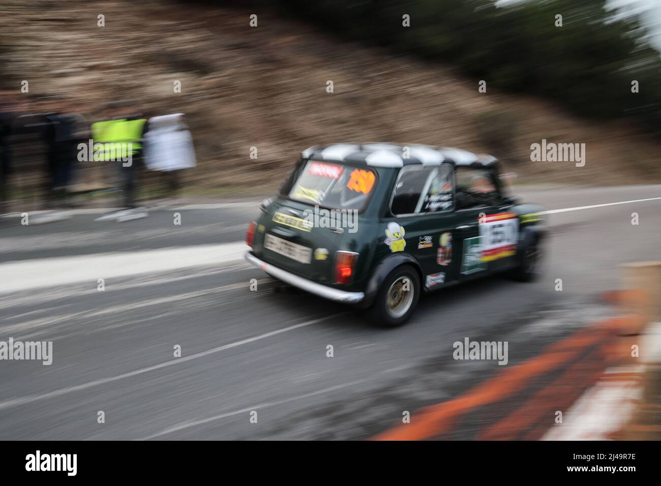 Historic Rally Costa Brava 2022 - Mini Cooper car competing in timed road section in Girona ...