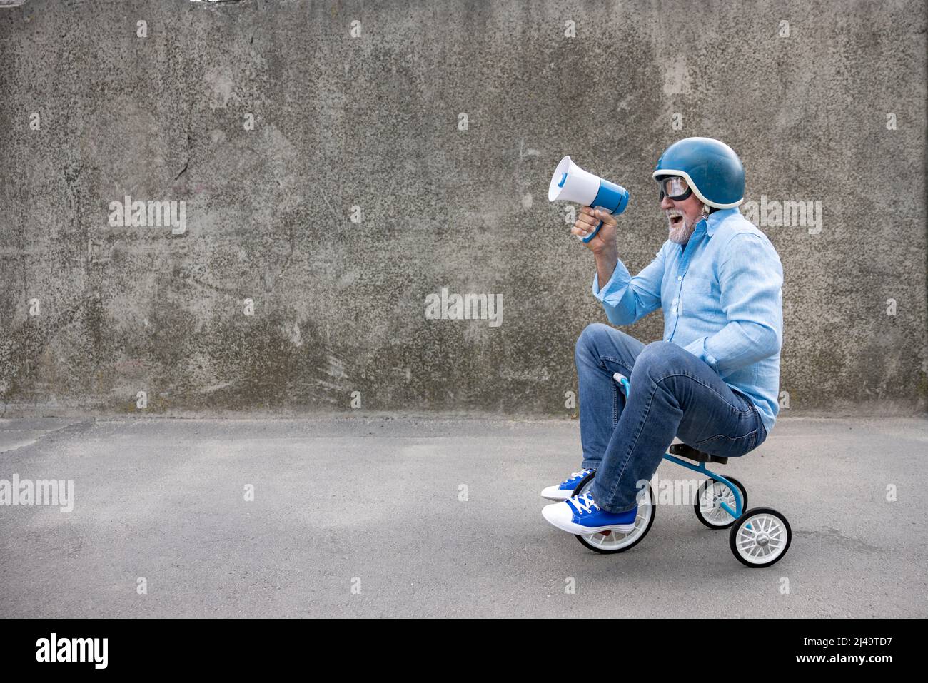 Riding trike senior hi-res stock photography and images - Alamy