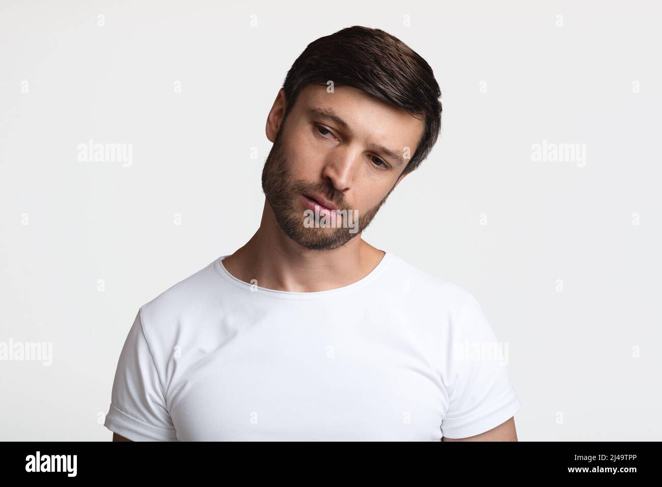 Sad male bowing head hi-res stock photography and images - Alamy