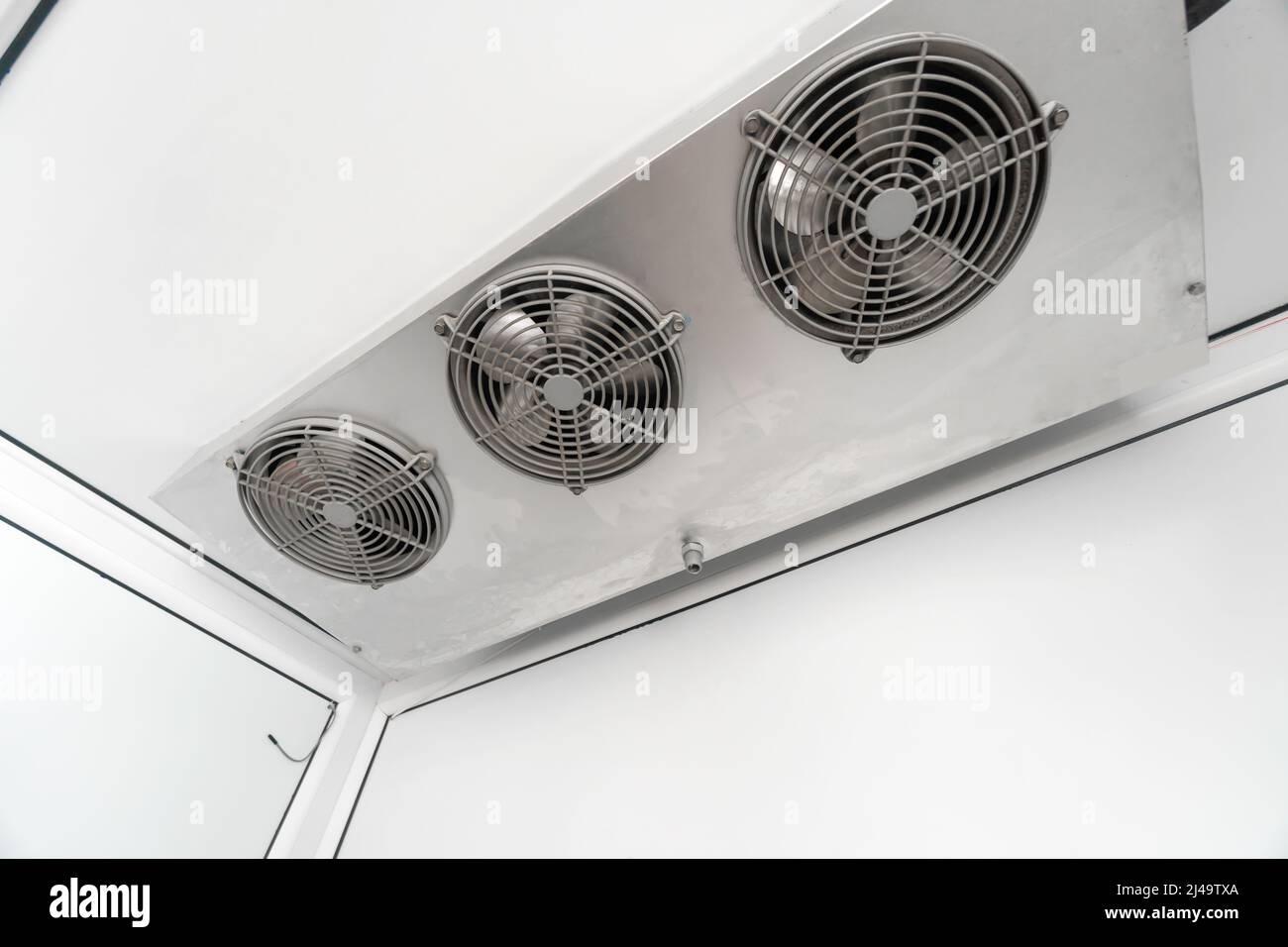 Three fans in the refrigerator. Cooling system Stock Photo - Alamy