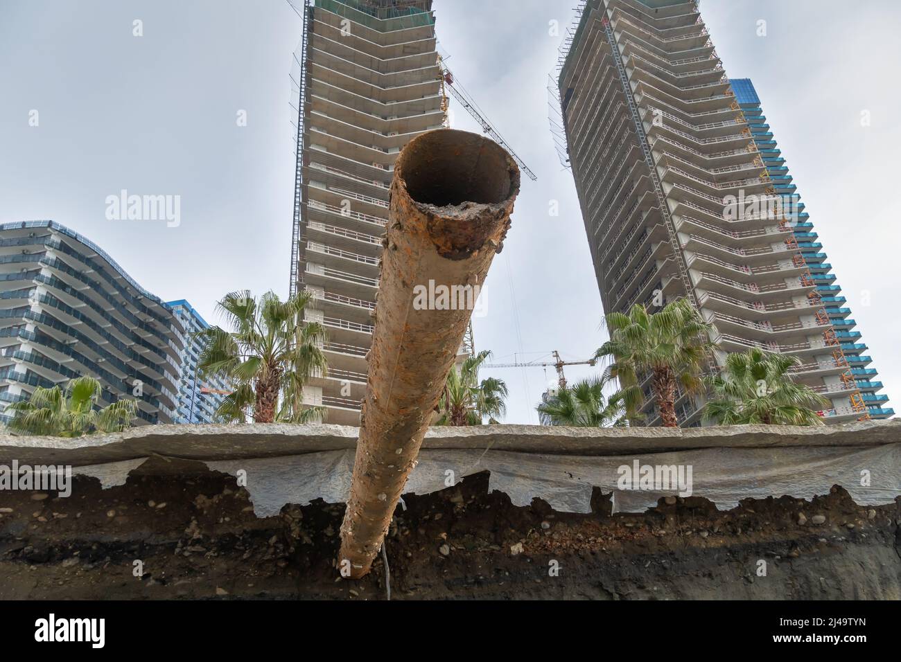 Destroyed embankment after the storm. the collapse of the ground ...