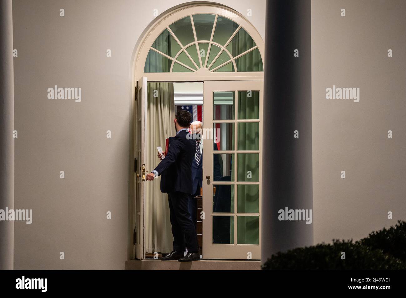 President Joe Biden exits the Outer Oval Office with Personal Aide ...