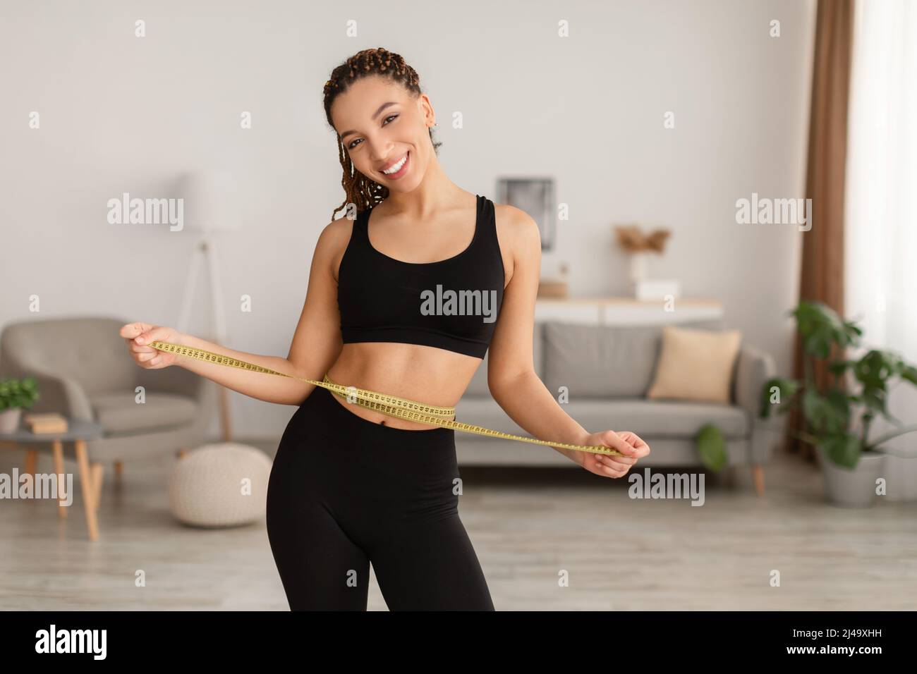 Lady measuring hi-res stock photography and images - Alamy