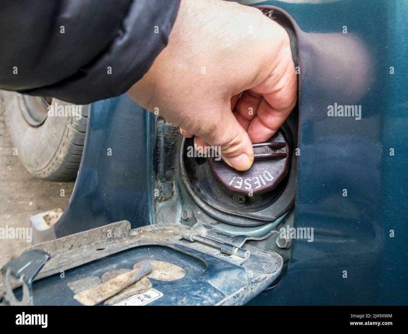 An English petrol filling station customer with an old diesel van ...
