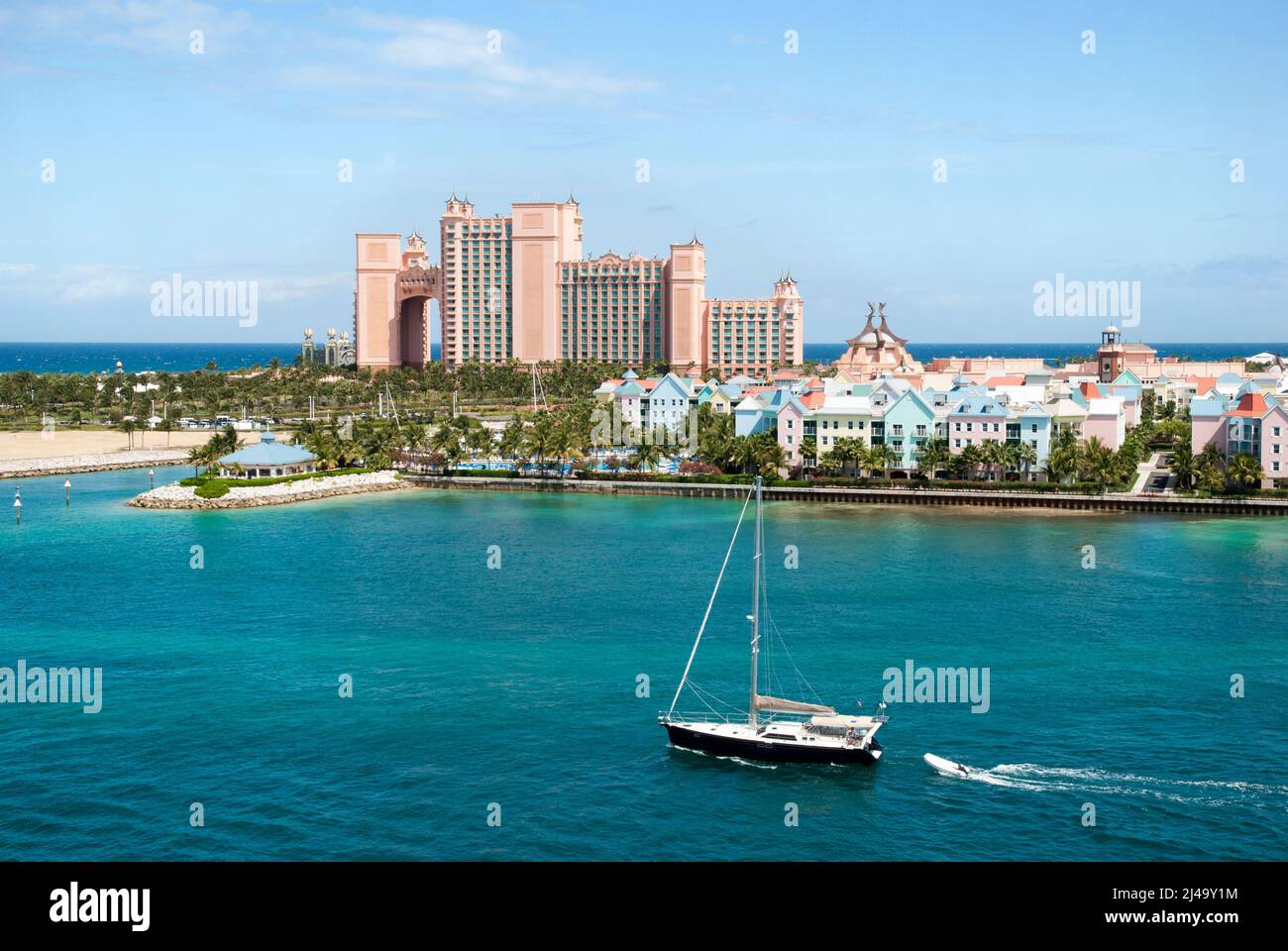 The aerial view of a yacht passing by in Nassau Harbour and Paradise ...