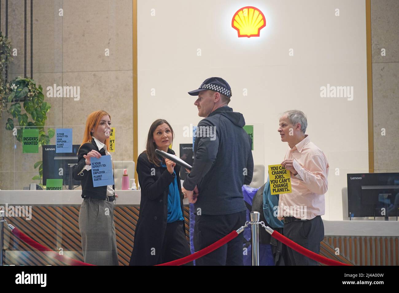 Activists from Extinction Rebellion attach themselves to the reception ...