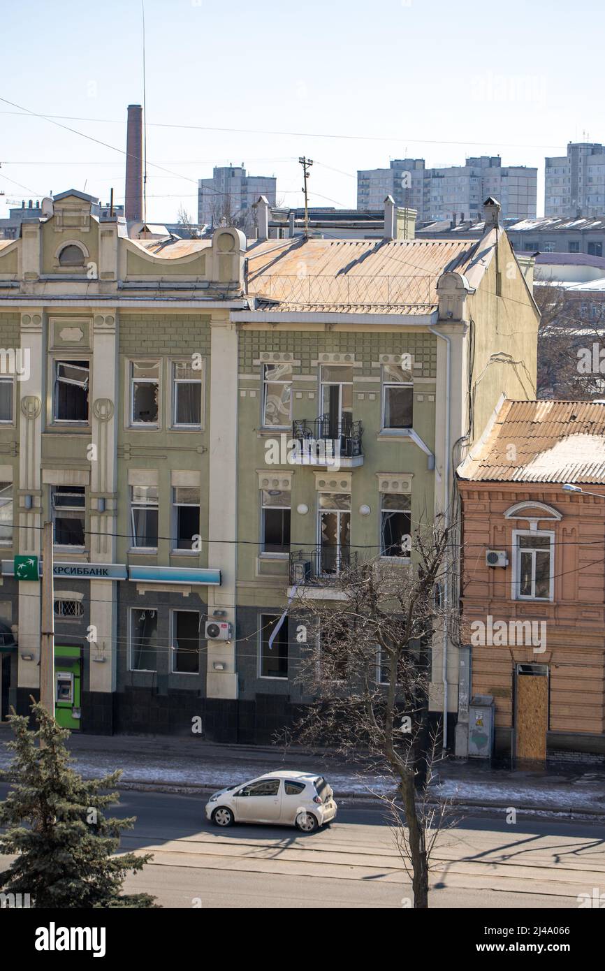 View of a bank building with broken windows. Russian army aviation ...