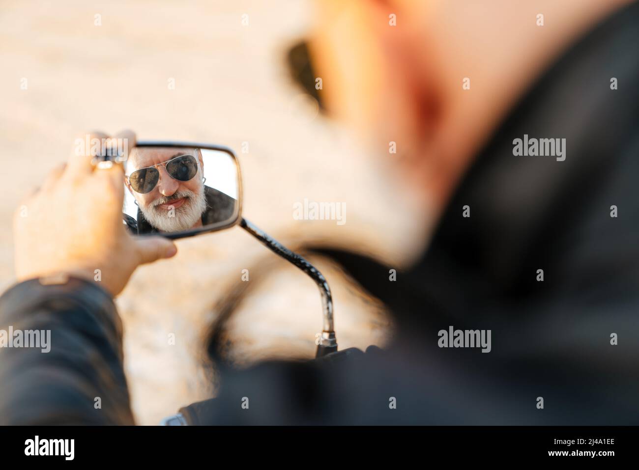 Rear view mirror man sunglasses hi-res stock photography and images - Alamy
