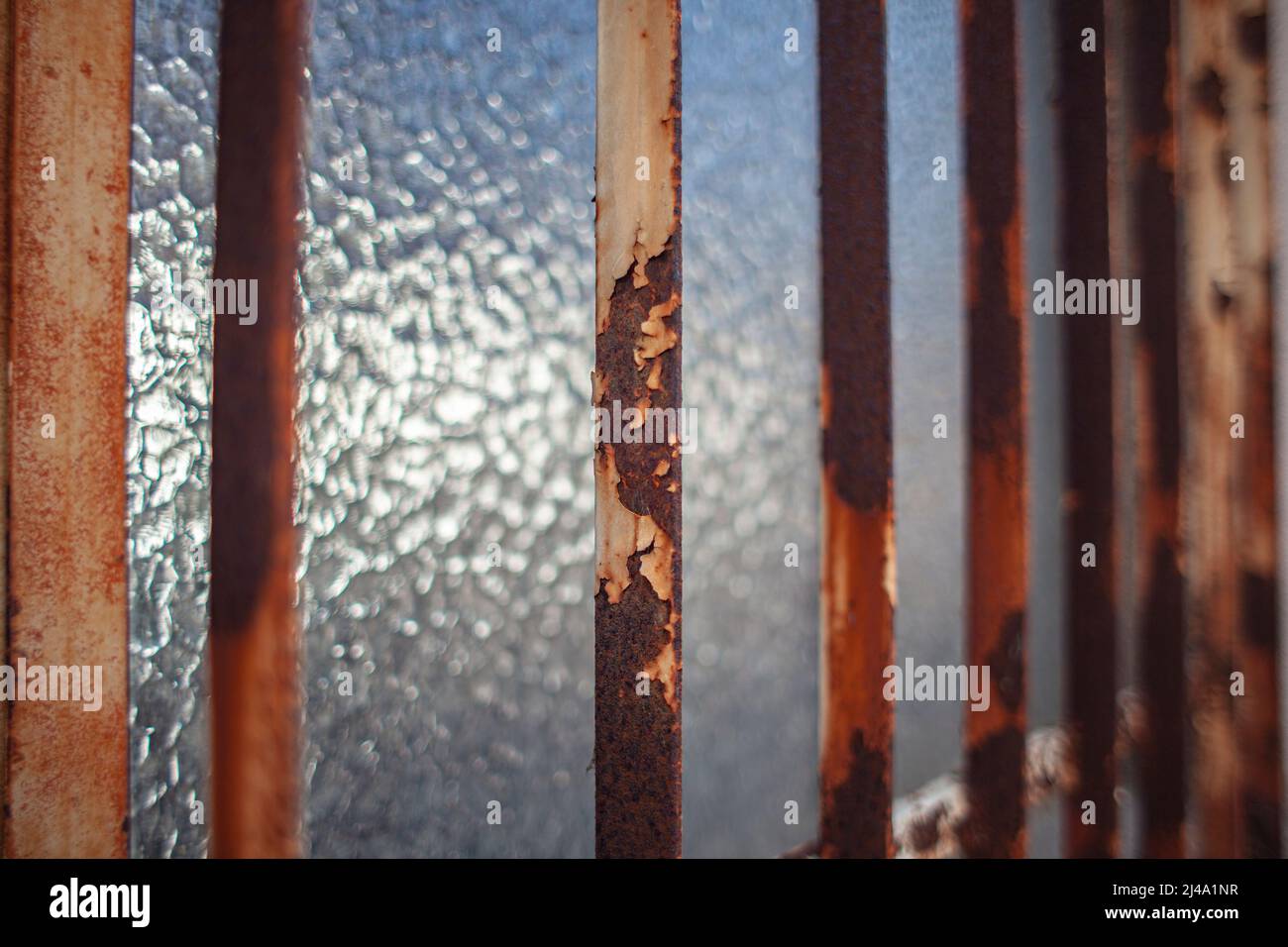 Detail of Old rusty grates on the window Stock Photo - Alamy