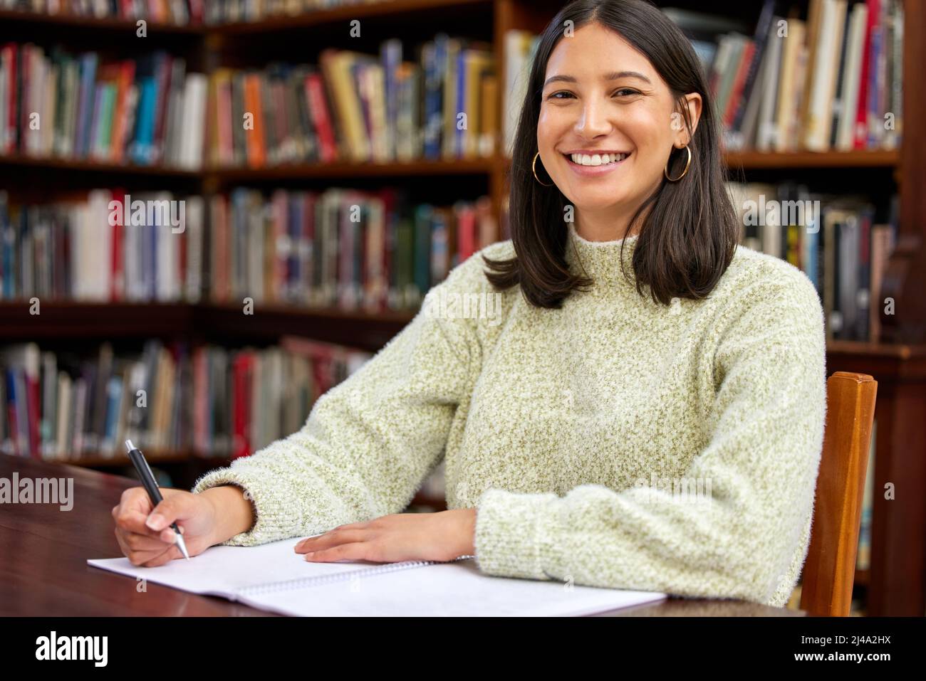 Libraries always remind me that there are good things. Shot of a young ...