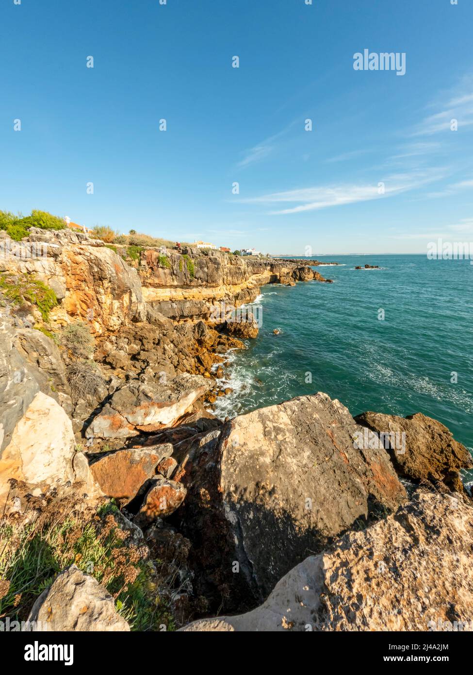 Lisbon, Portugal - Cliffs with fallen rock cliffs and formations of ...