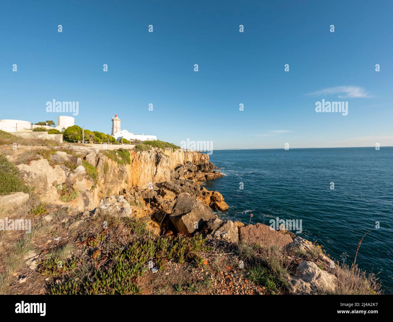 Lisbon, Portugal - Cliffs with fallen rock cliff and formations of Cabo ...