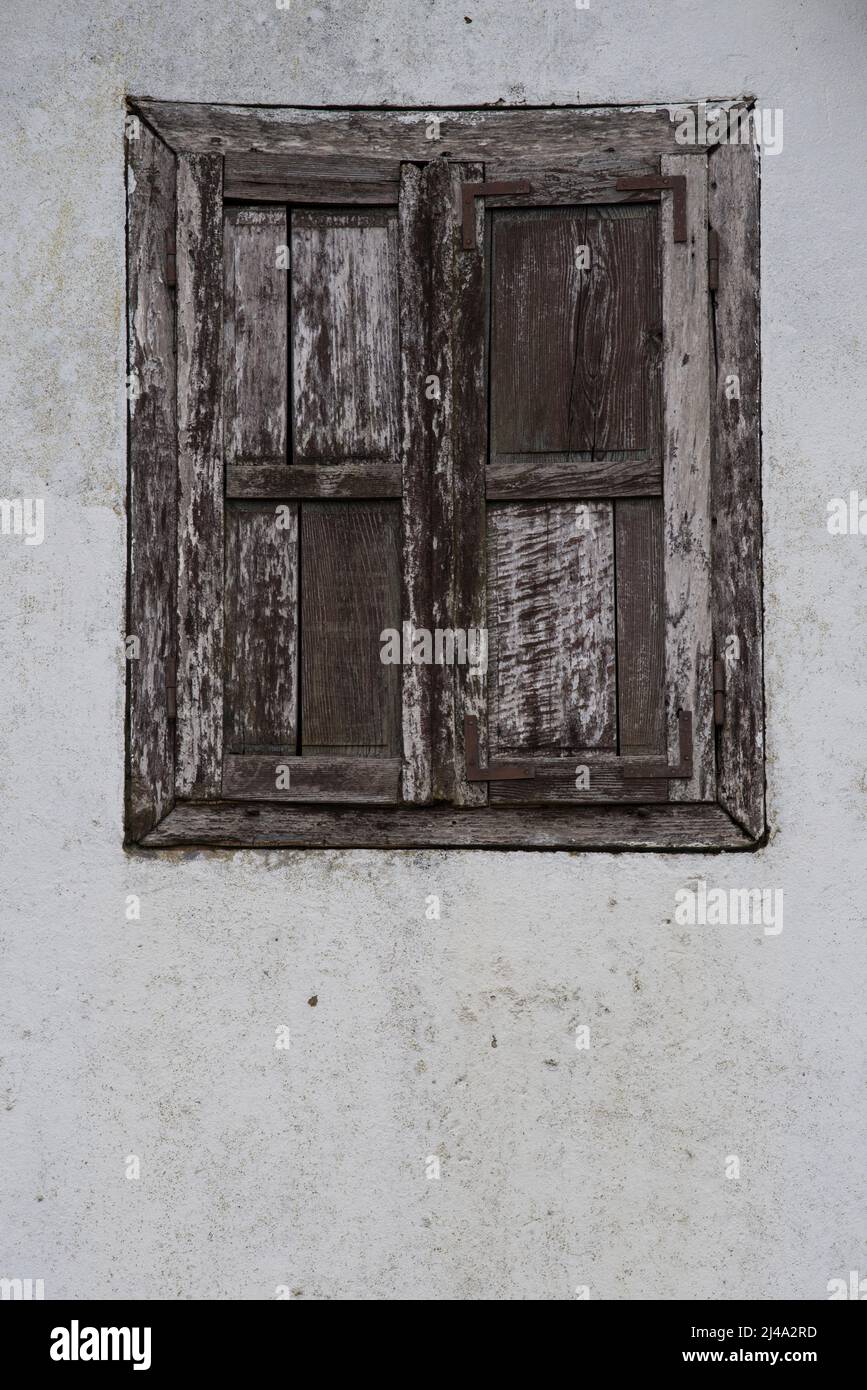 Sunja, Croatia, April 22,2022:: Rustic style aged window at rural home ...