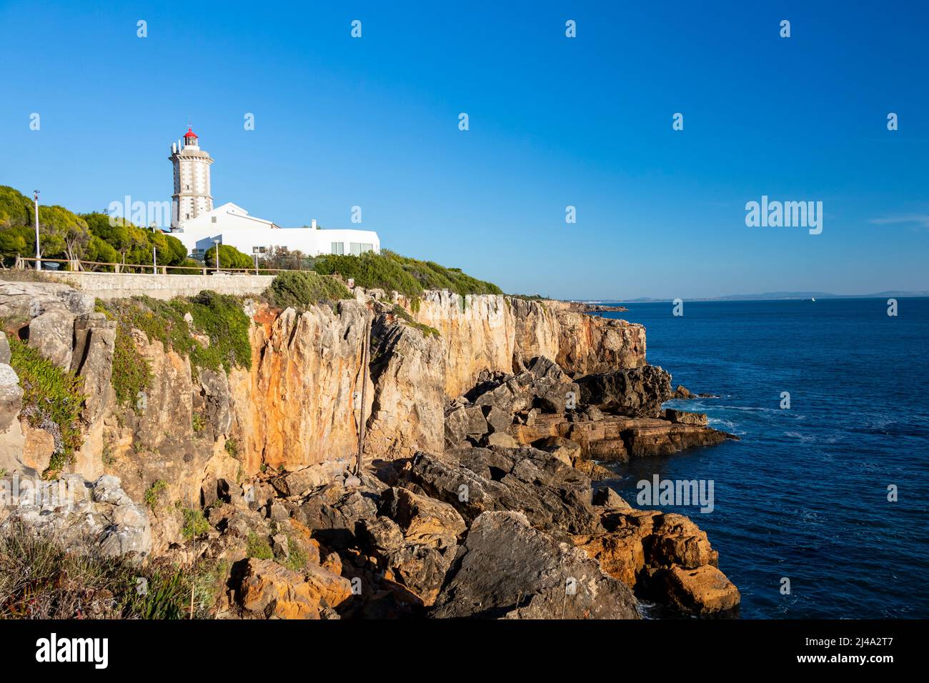 Lisbon, Portugal - Cliffs with fallen rock cliff and formations of Cabo ...