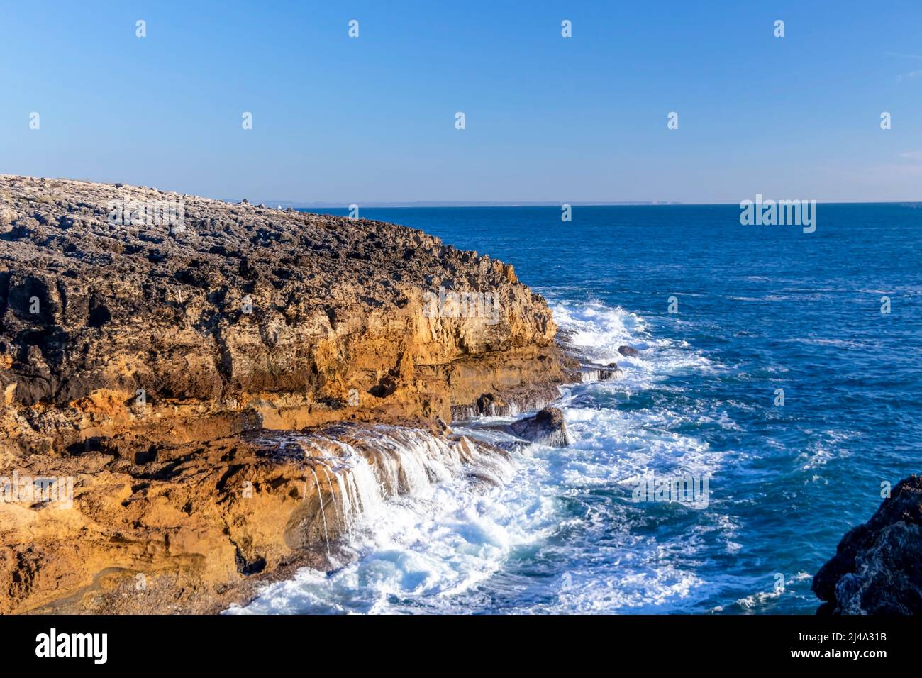 Lisbon, Portugal - Cliffs with fallen rock cliffs and formations of ...