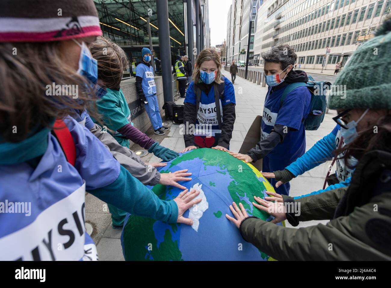 Environmental protesters outside government buildings in Whitehall ...
