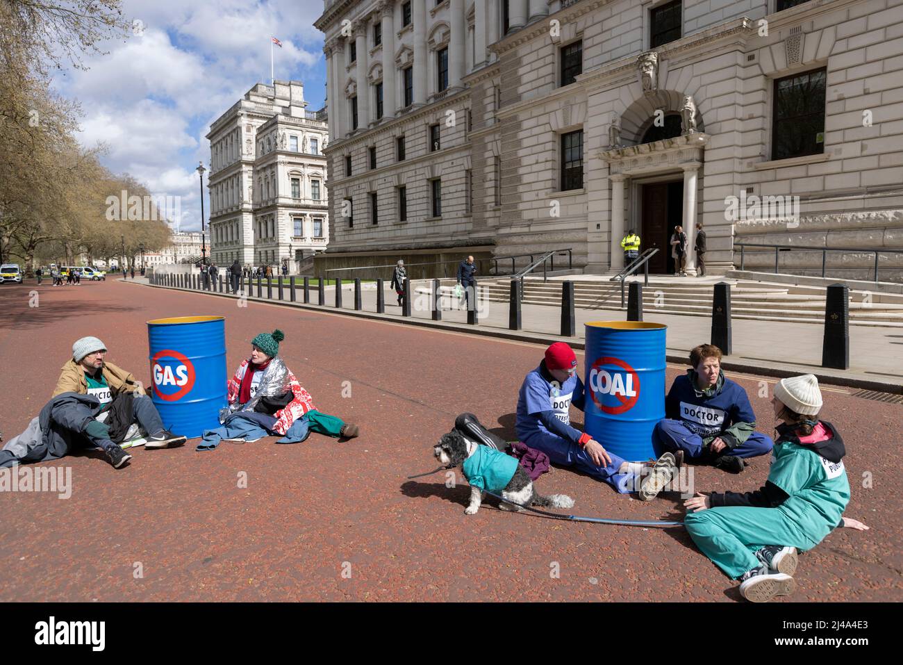 Environmental protesters outside government buildings in Whitehall ...