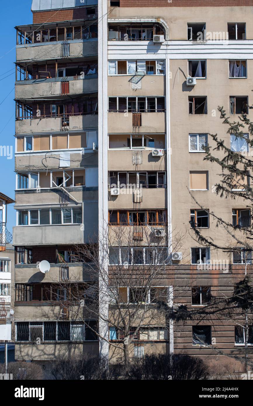 View of a residential building with broken windows. Russian army bombed ...