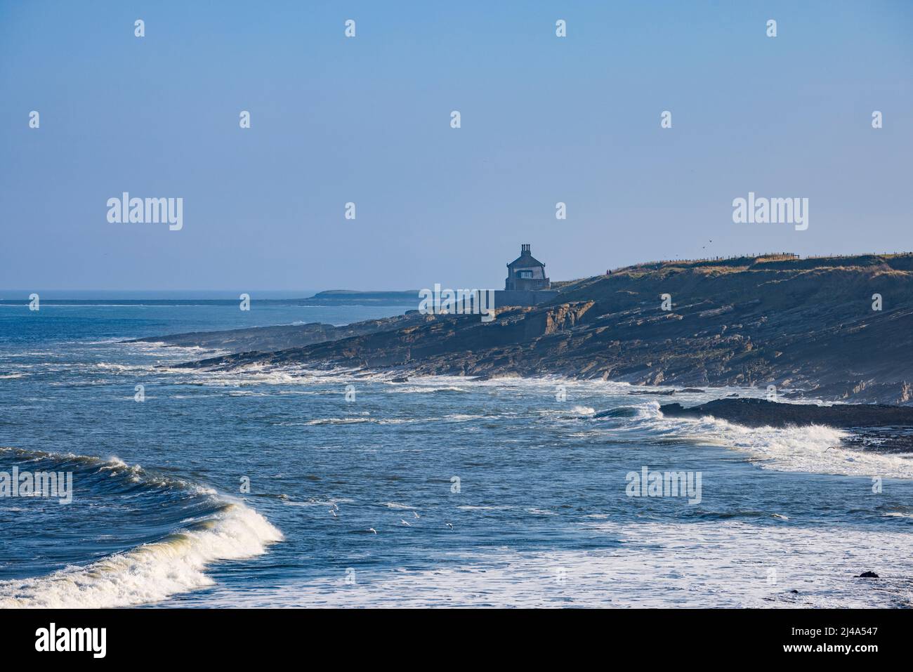 Looking south towards the Howick Bathing House with rough seas ...